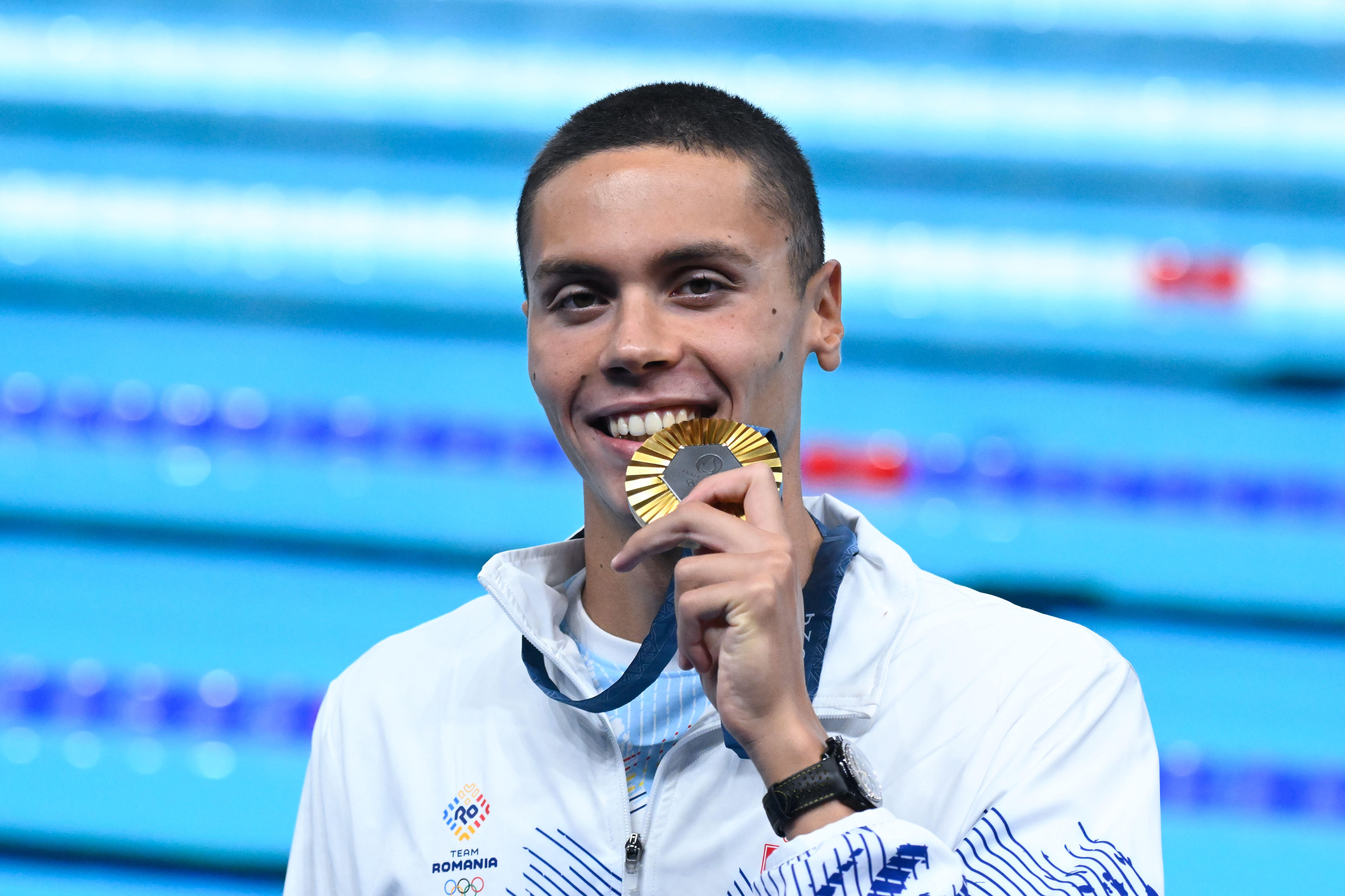 David Popovici e campion olimpic la 200 metri liber şi aduce prima medalie pentru România la ...