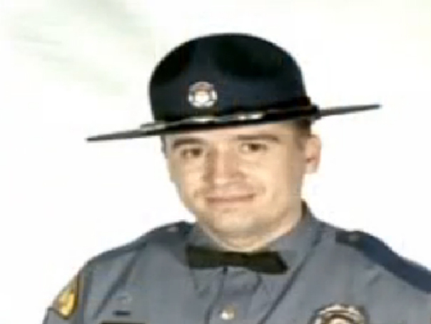 Sute de persoane la ceremonia organizată în memoria poliţistului român ...